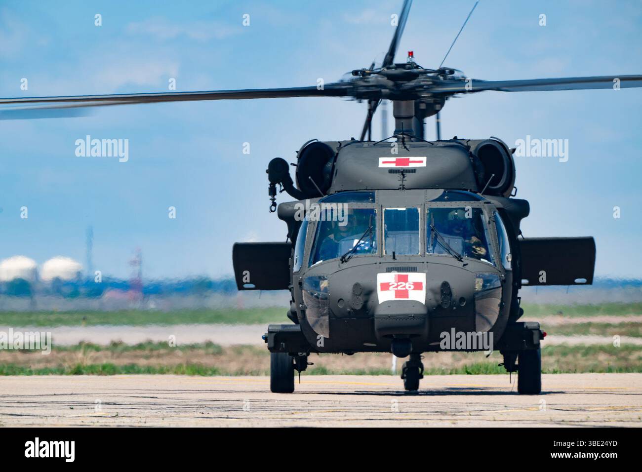 A UH-60 Blackhawk helicopter taxis on the flight line at the Pueblo ...