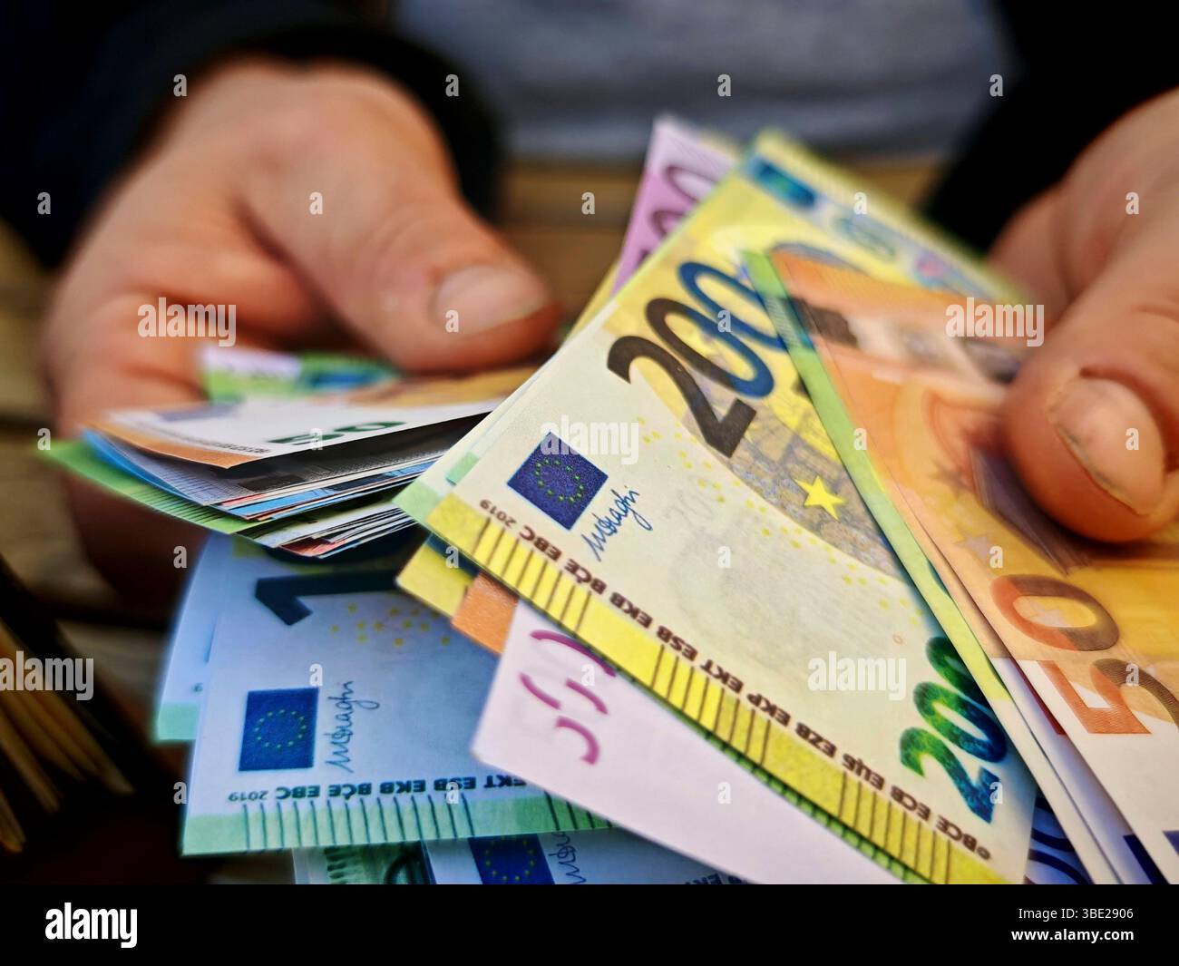 euro bank notes for cash transactions, paying in the european union ...