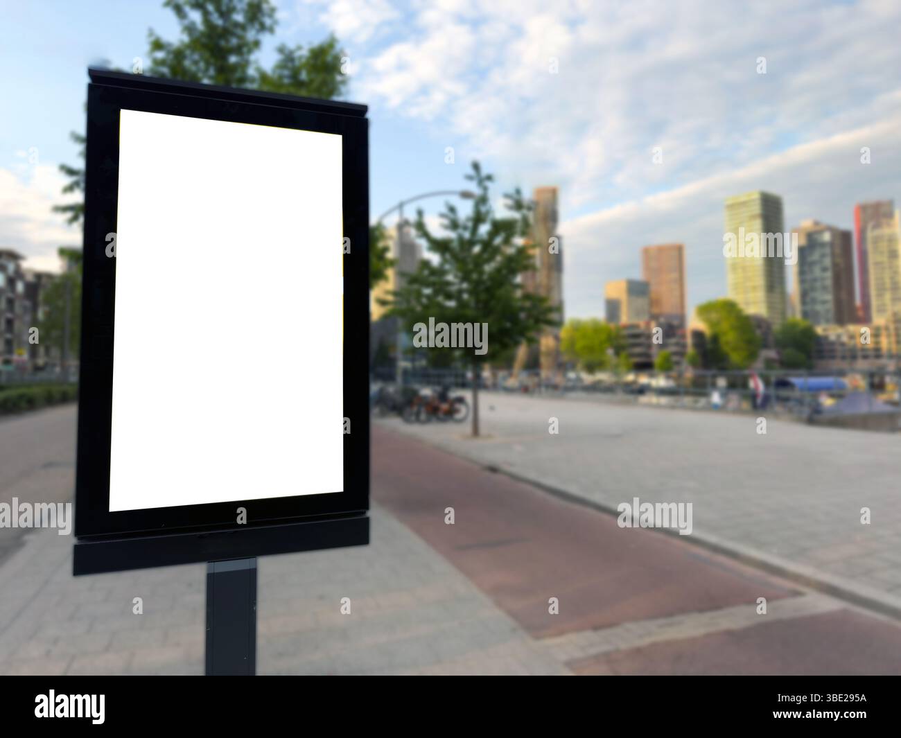 Blank advertise display stand, empty vertical billboard on the sidewalk ...