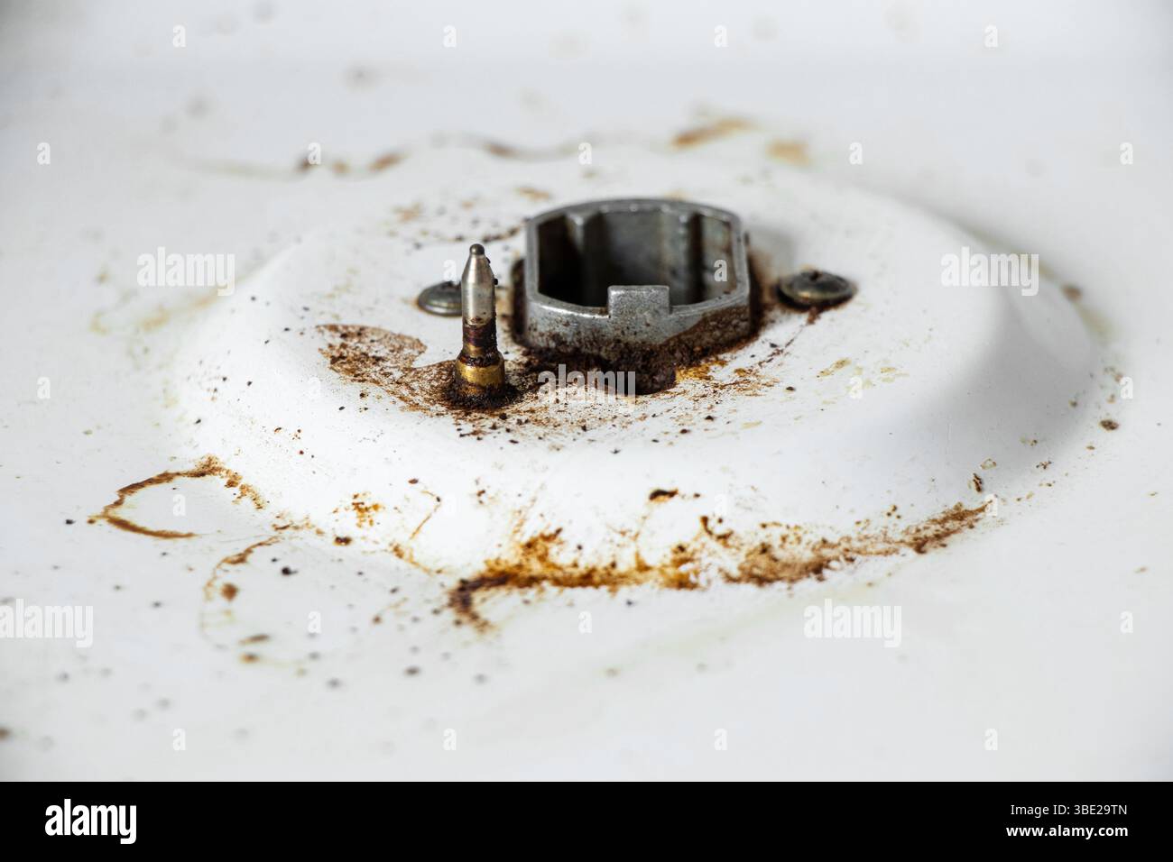 Dirty gas stove surface with grease stains and burn marks close-up ...