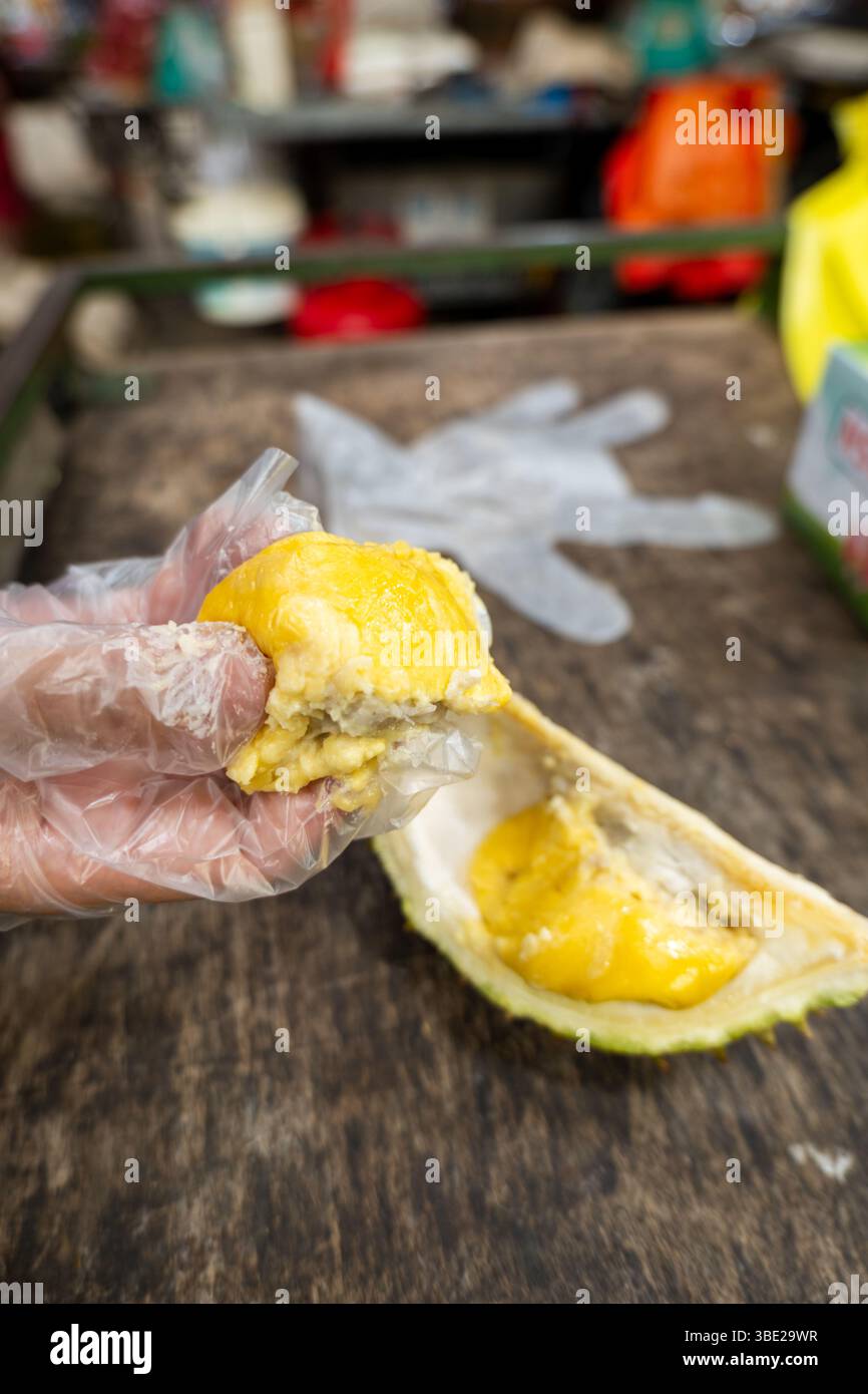 Durian fruit meat close-up in Asia. The durian is the edible fruit of ...