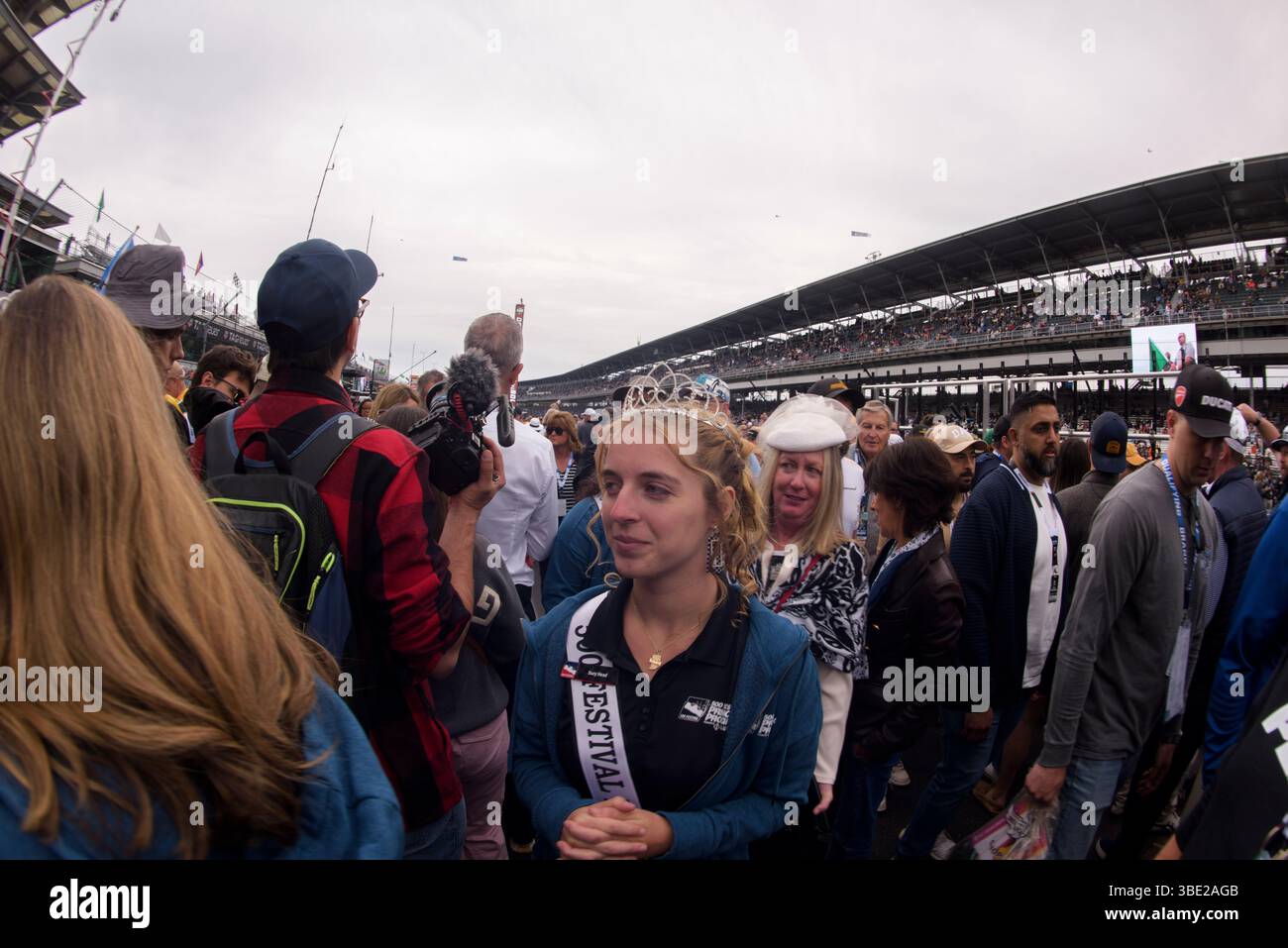 A 500 festival princess navigates the crowd before the NTT IndyCar ...