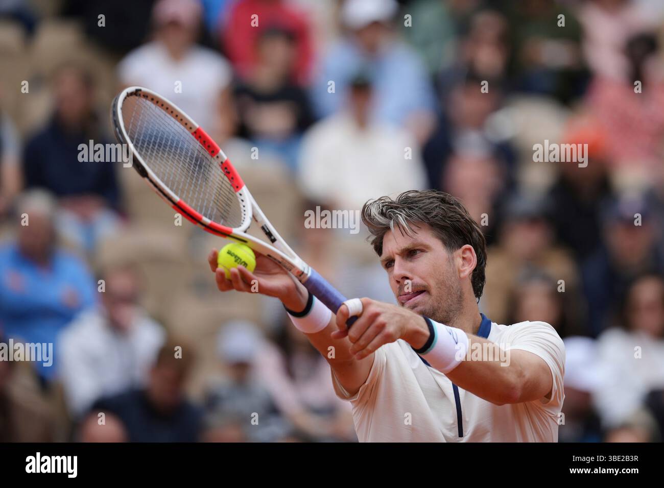 Britain's Cameron Norrie serves against Russia's Daniil Medvedev during ...