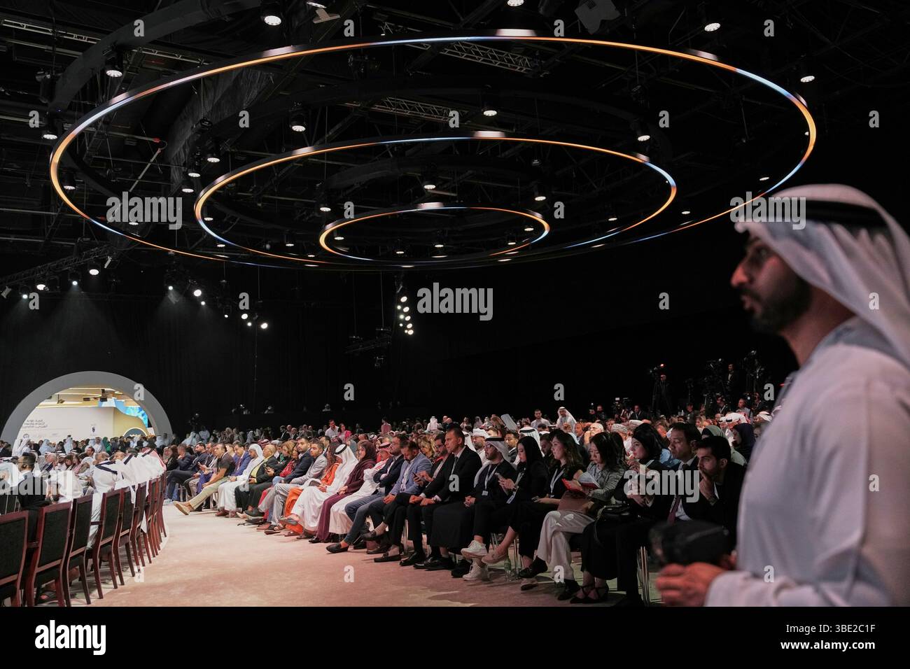 Visitors attend a session at the Arab Media Summit 2025 in Dubai ...
