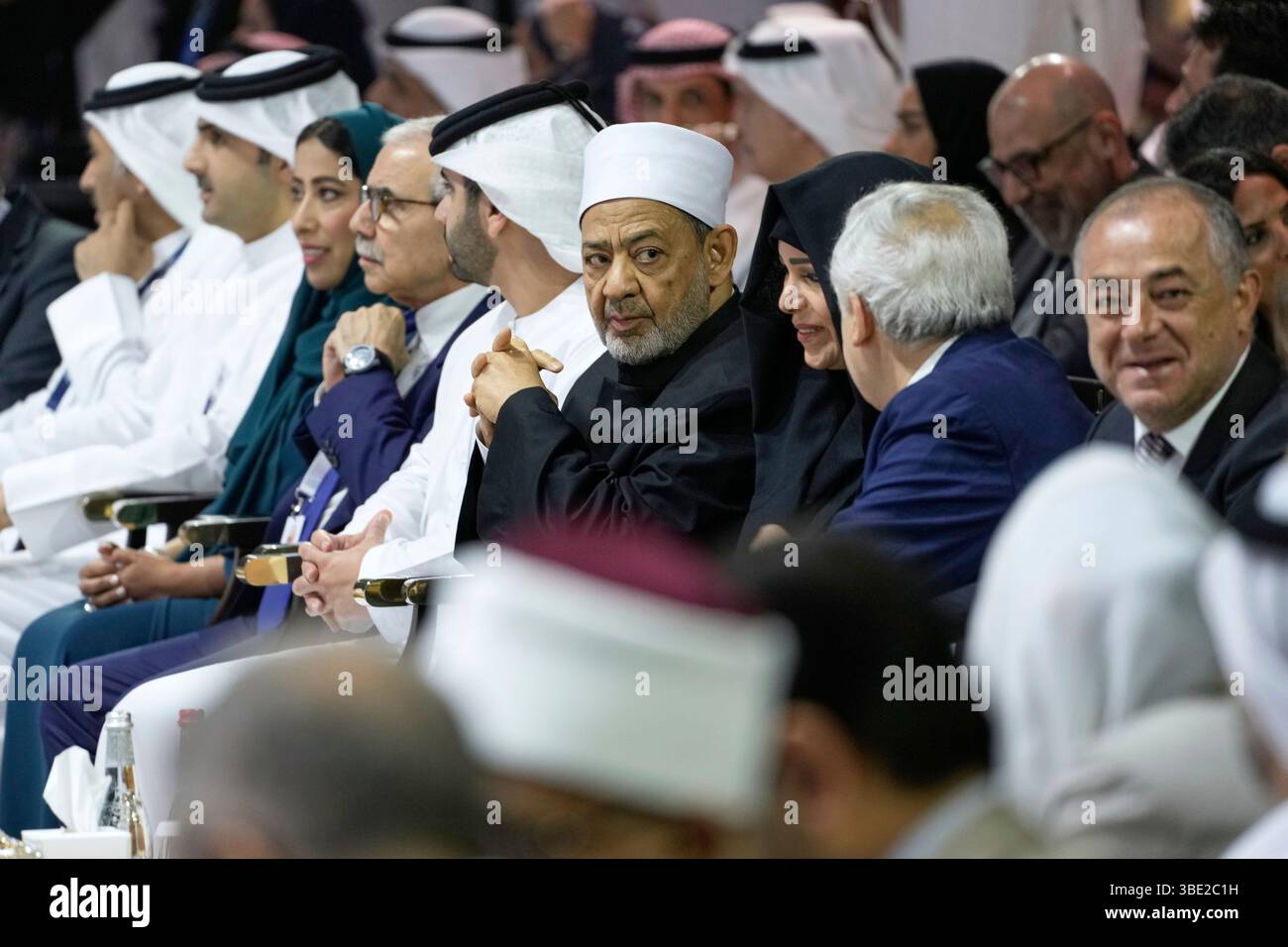 Sheik Ahmed el-Tayyib, center, Grand Imam of Al-Azhar Mosque, attends ...