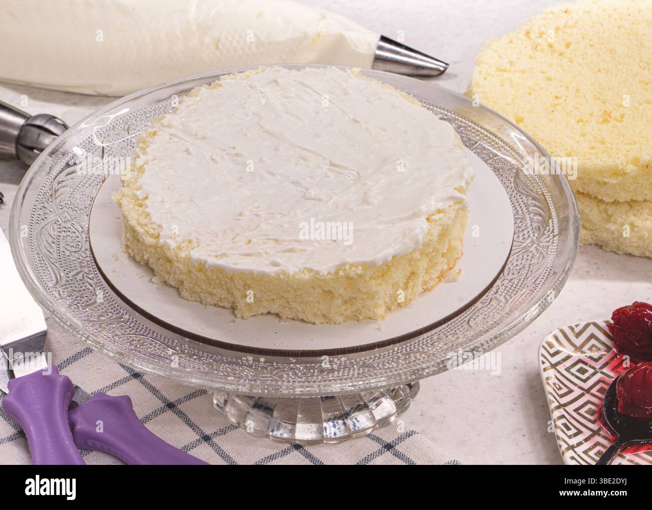 Cherry cake assembly process. dessert recipe background Stock Photo - Alamy