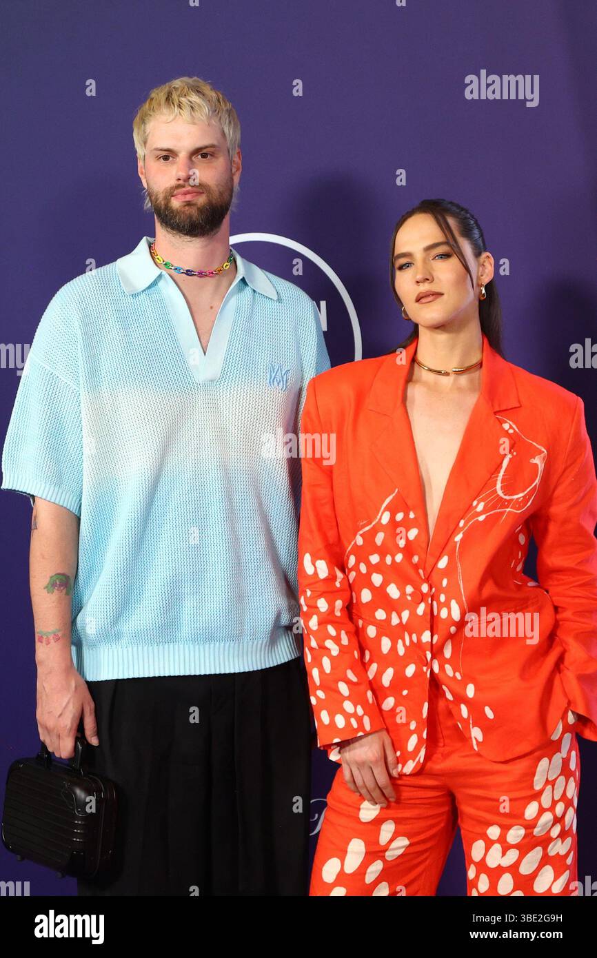 Tucker Halpern, Sophie Hawley-Weld at arrivals for 2025 American Music ...