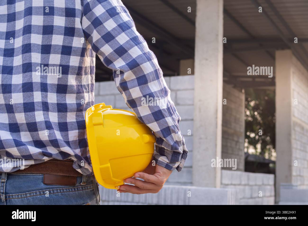 engineer hold helmet safety, industrial plant. Contractor and inspector ...