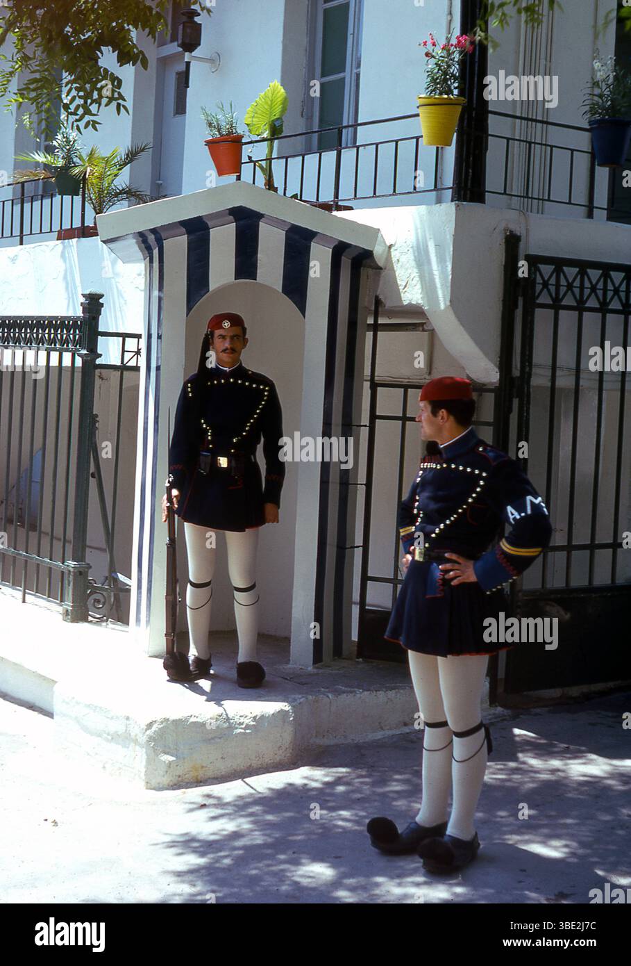 Evzones, elite soldiers in traditional uniforms on guard duty in Athens ...