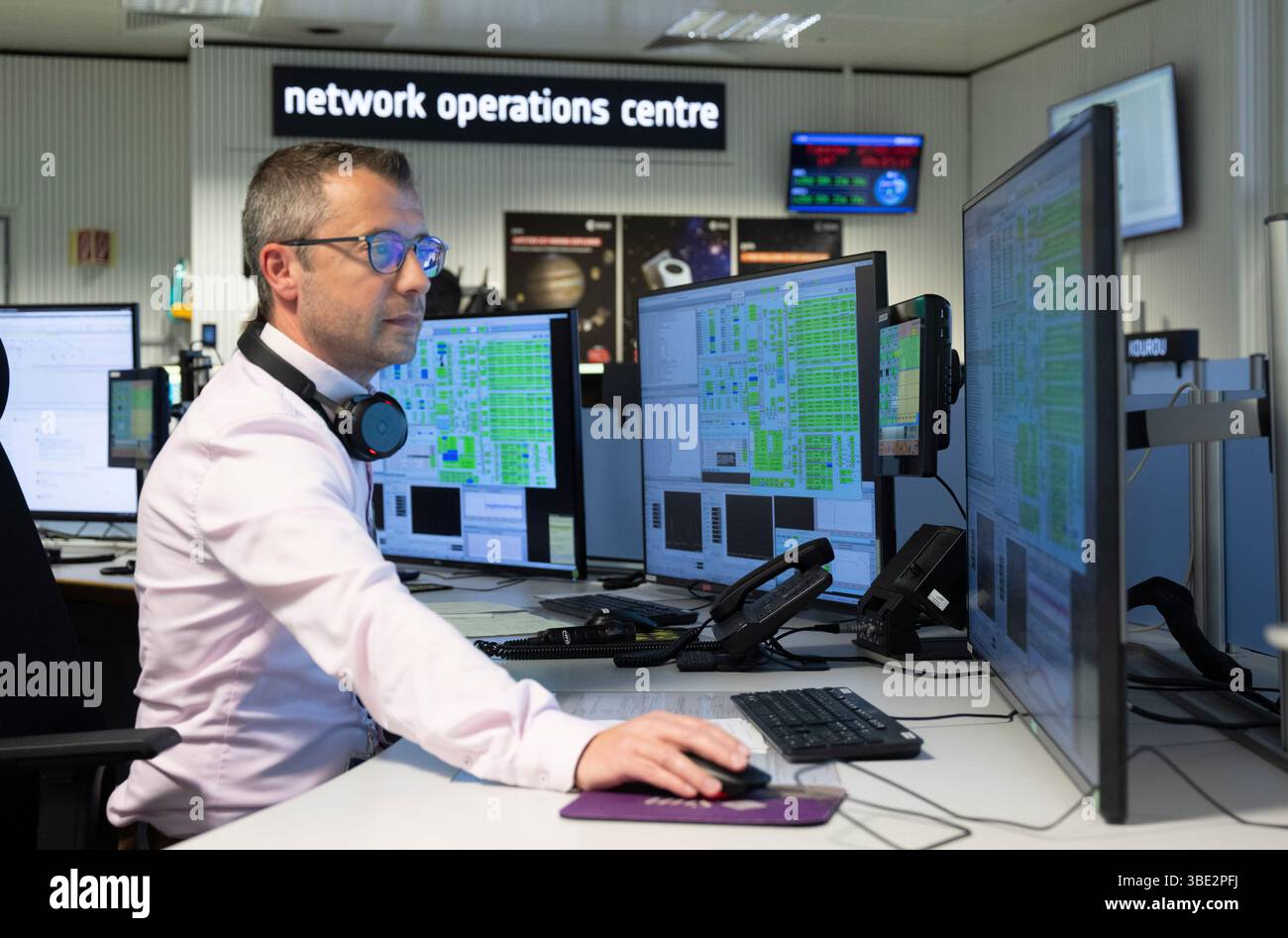 Darmstadt, Germany. 27th May, 2025. An Esa employee sits in the Network ...