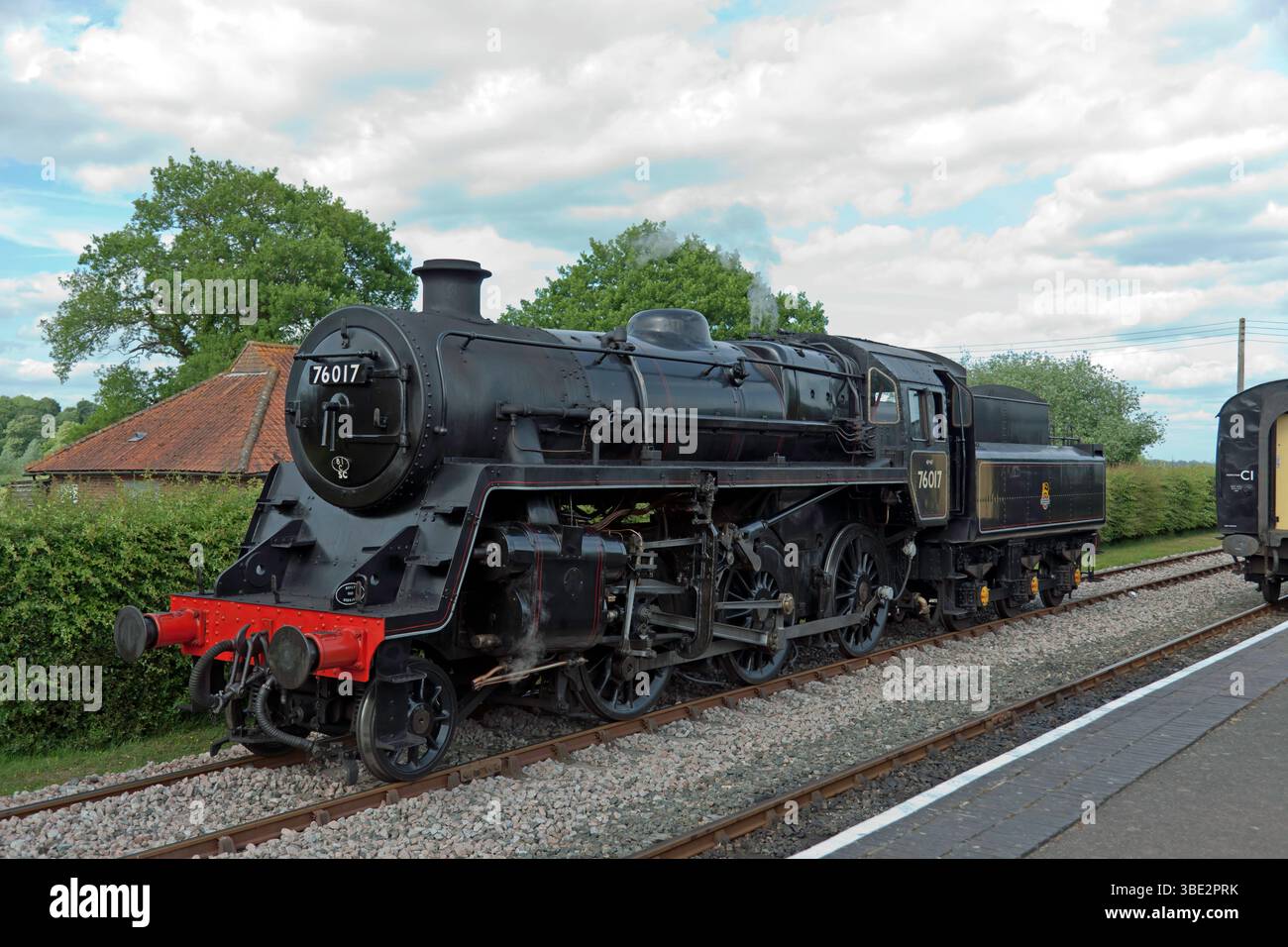 Steam Locomotive No 76017, de-coupled from the train, at Bodium Station ...