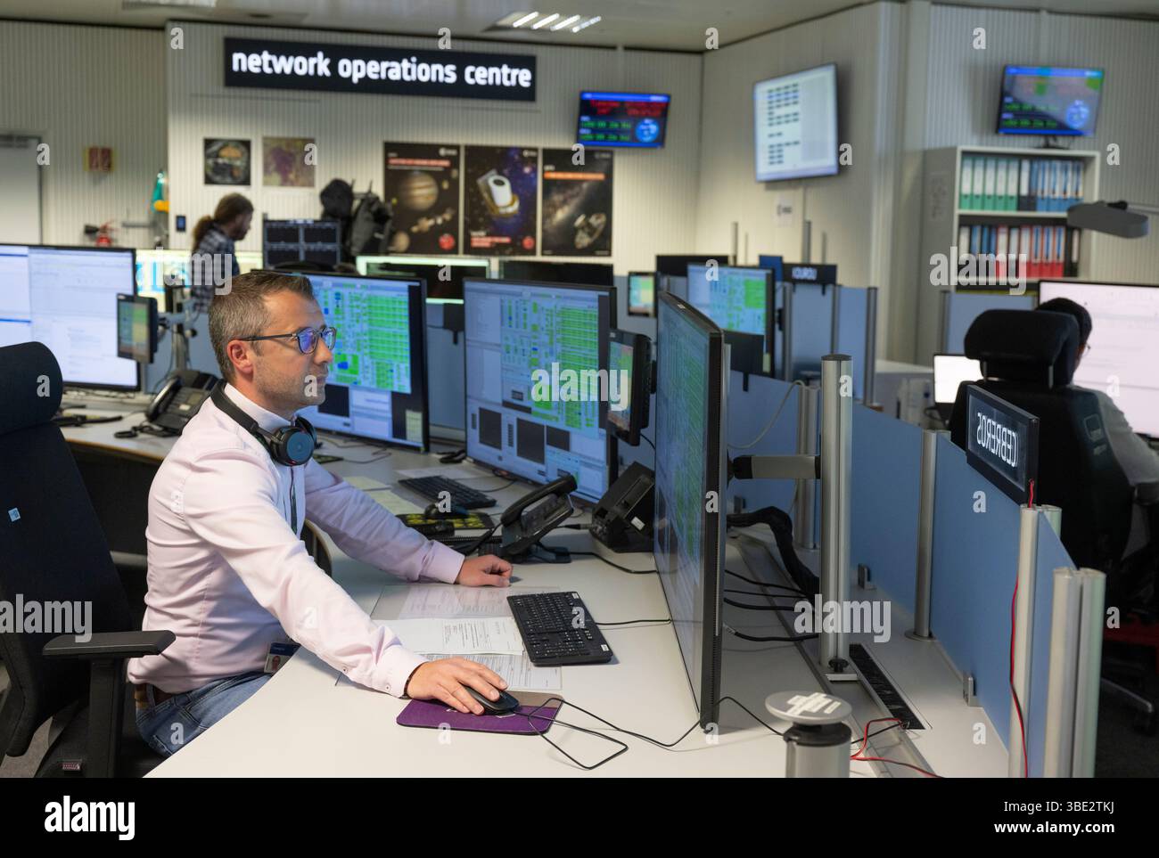 Darmstadt, Germany. 27th May, 2025. Esa employees sit in the Network ...