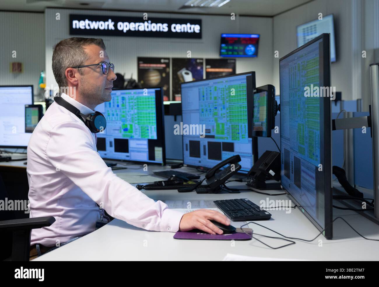 Darmstadt, Germany. 27th May, 2025. An Esa employee sits in the Network ...
