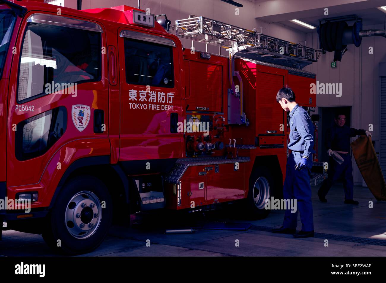 Firetruck in firehouse hi-res stock photography and images - Alamy