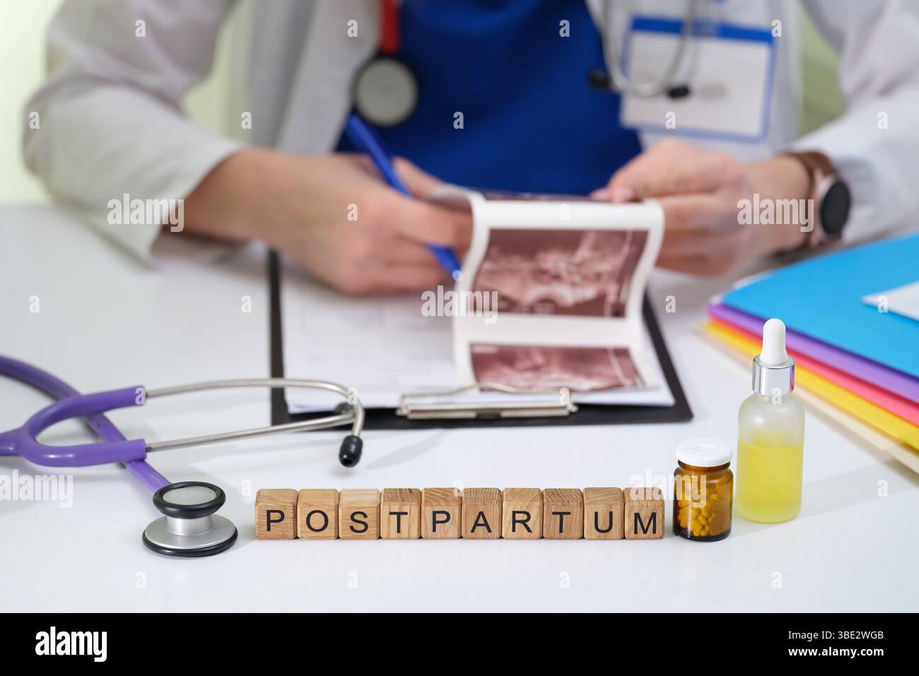Postpartum Care A Doctor with Health Tools and Ultrasound Images ...