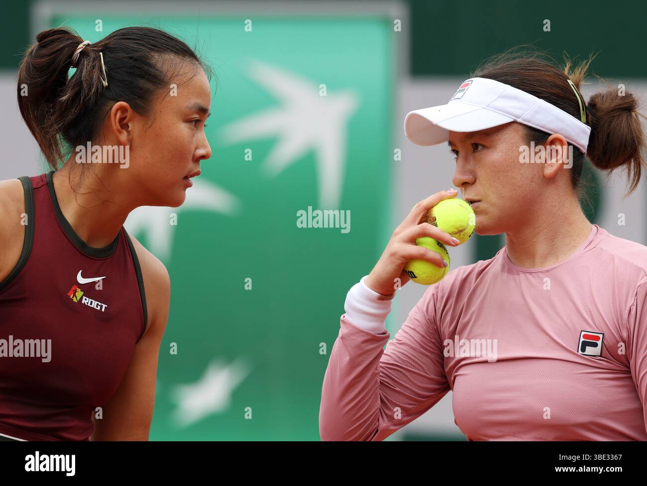 Paris, France. 27th May, 2025. Lulu Sun (R)/Yuan Yue communicate during ...