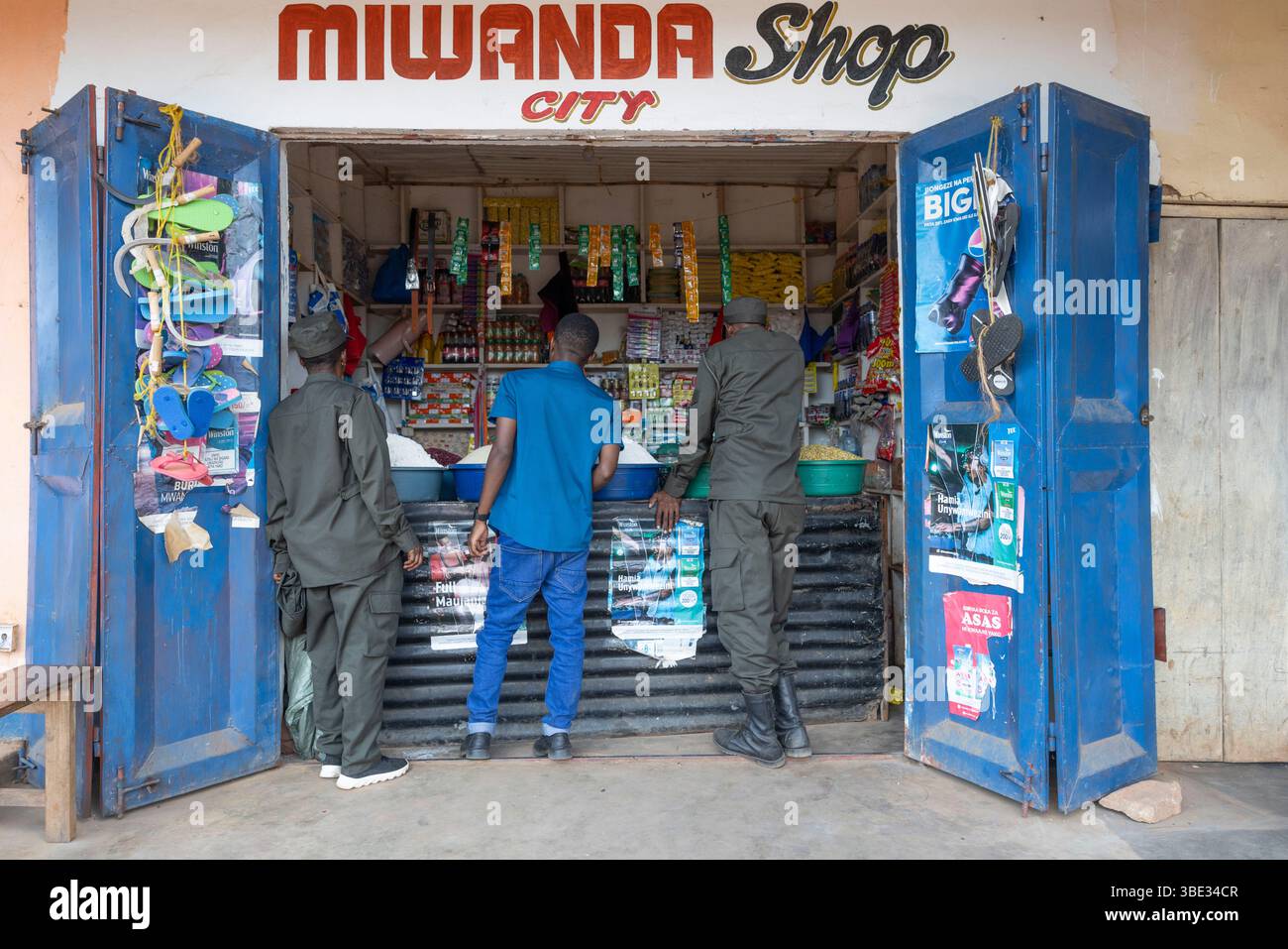 Tanzania, Tunduru region, Nalika Rangers shopping at a small grocery ...