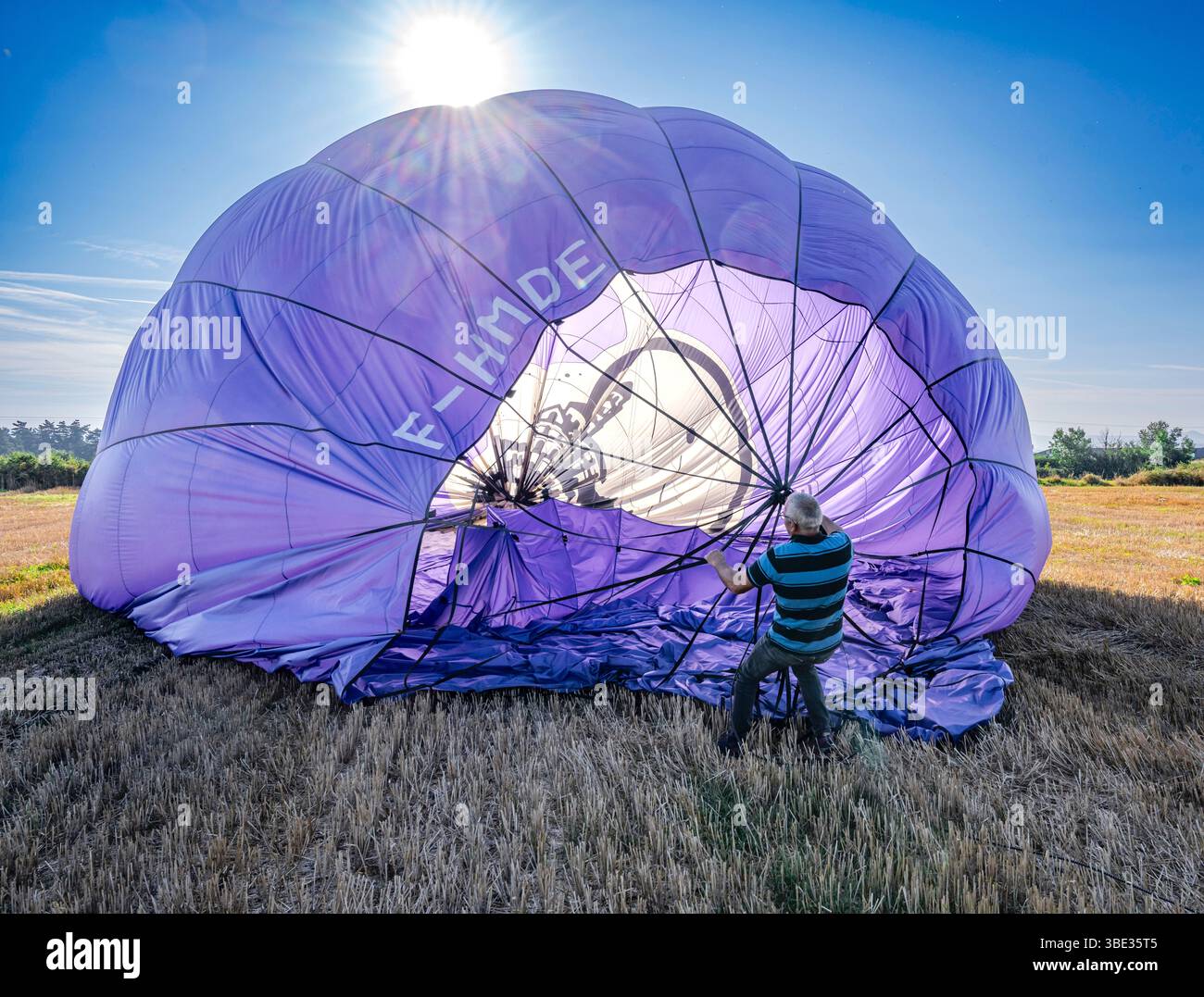 France, Haute Loire, Air Balloon Flight, Landing and balloon deflating ...