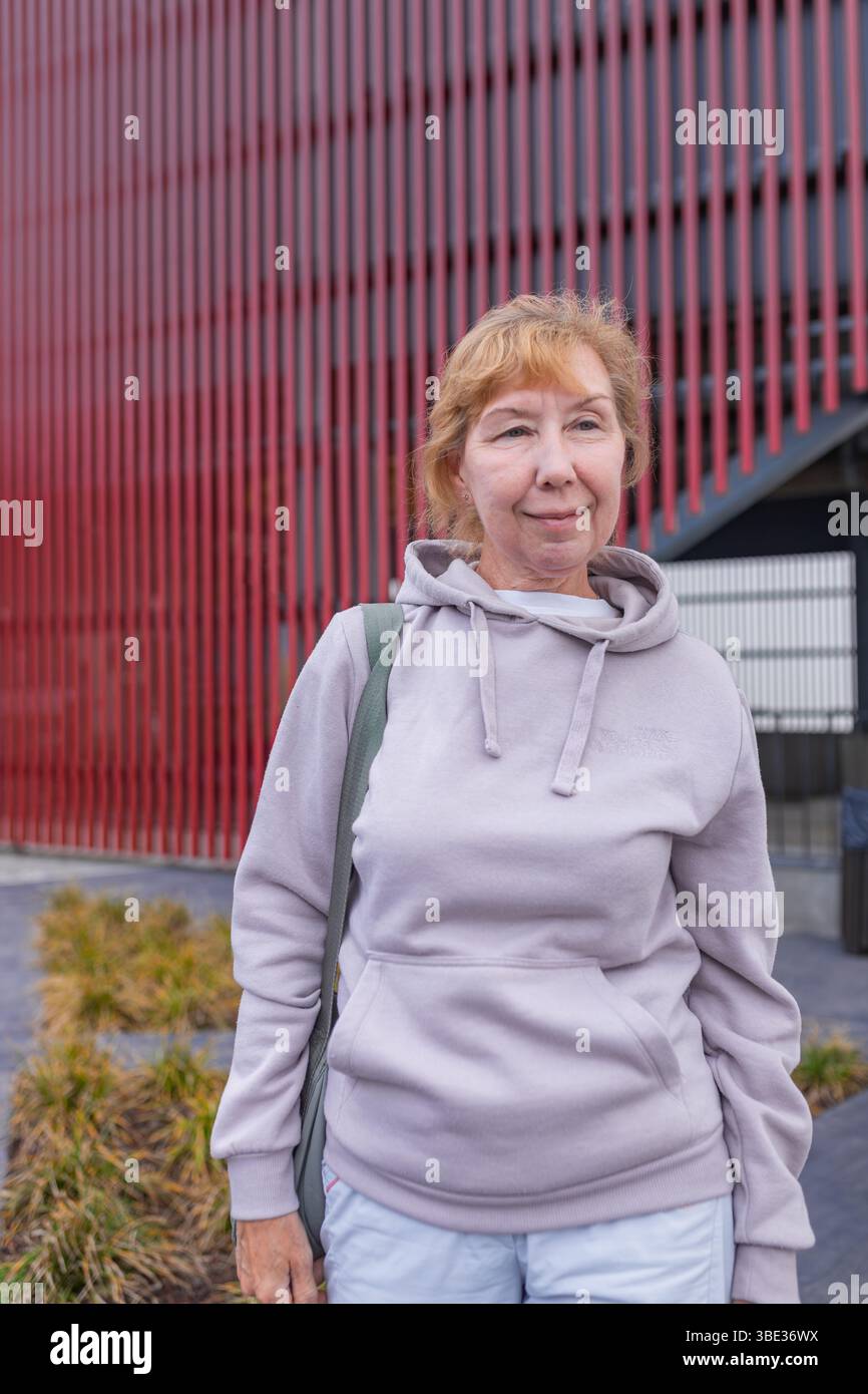 Person in red hoodie hi-res stock photography and images - Alamy