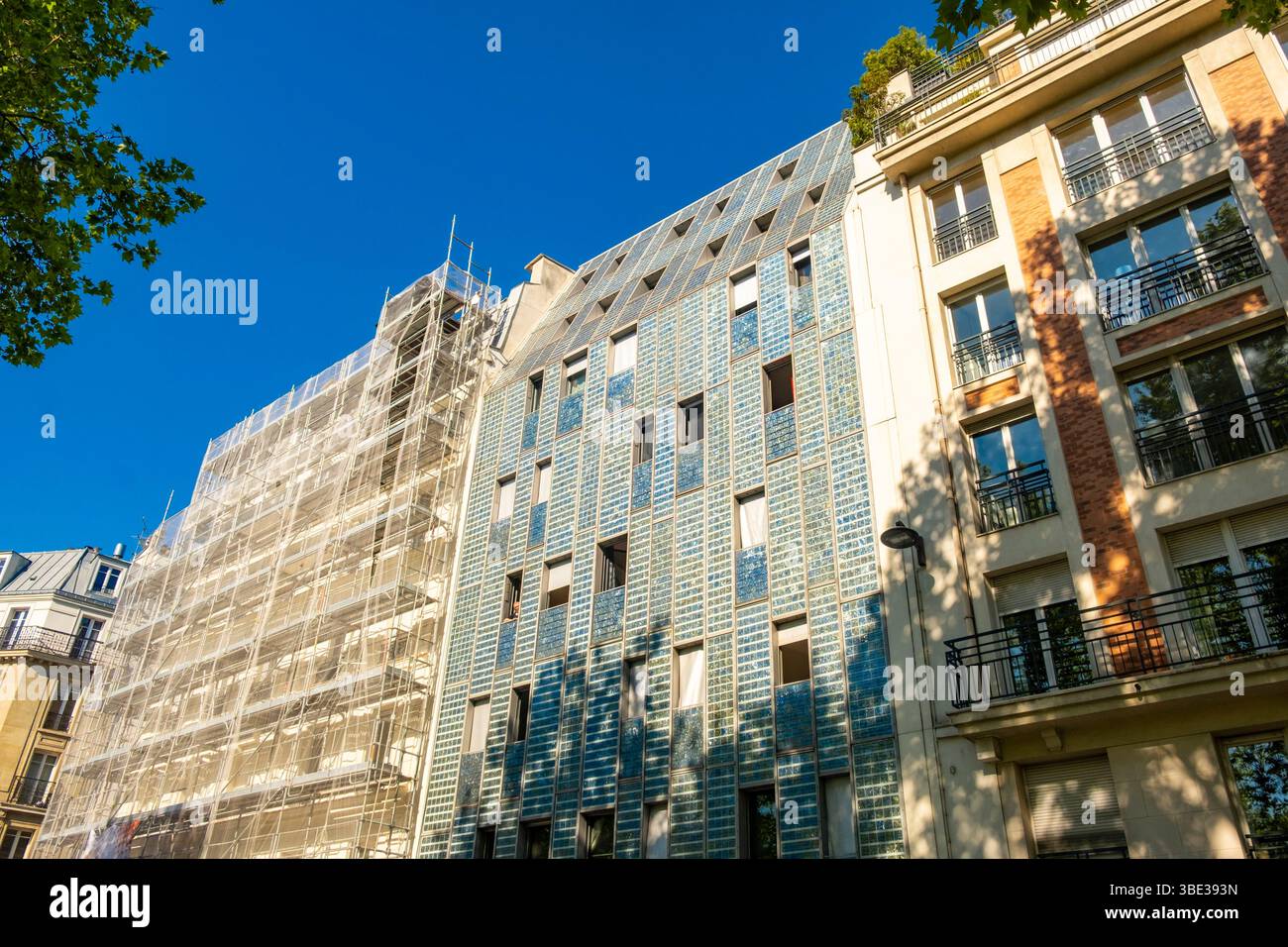 France, Paris, Emmaüs social housing building covered with solar panels ...