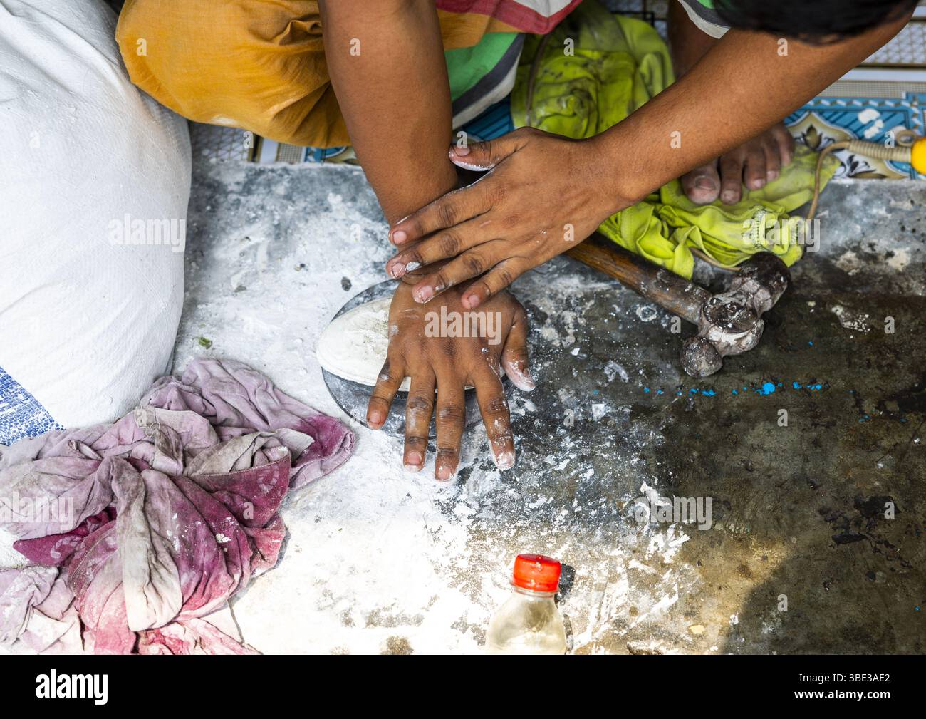 Metal worker using old lost wax casting method to create jewels, Dhaka ...