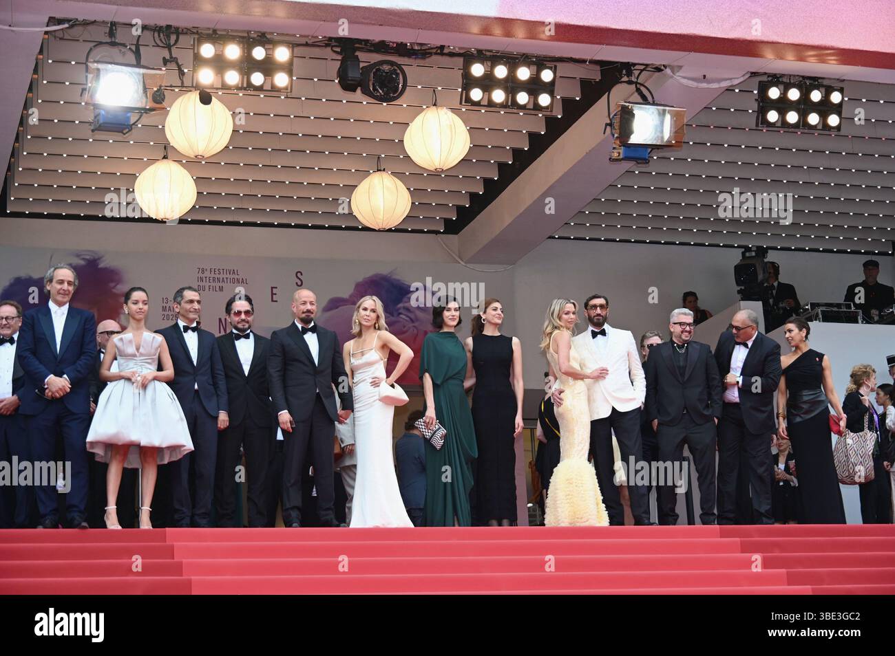 Cast and crew of the film: Alexandre Desplat, Lyna Khoudri (in Chanel ...