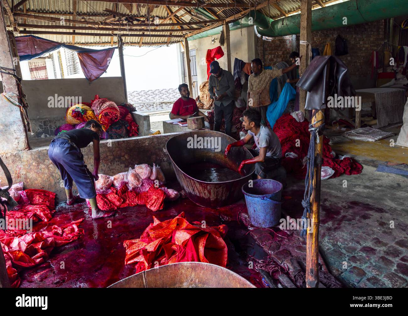Bangladeshi men working in a batik factory, Chittagong Division ...