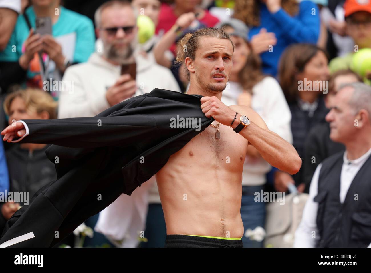 Germany's Alexander Zverev changes his shirt after defeating United ...