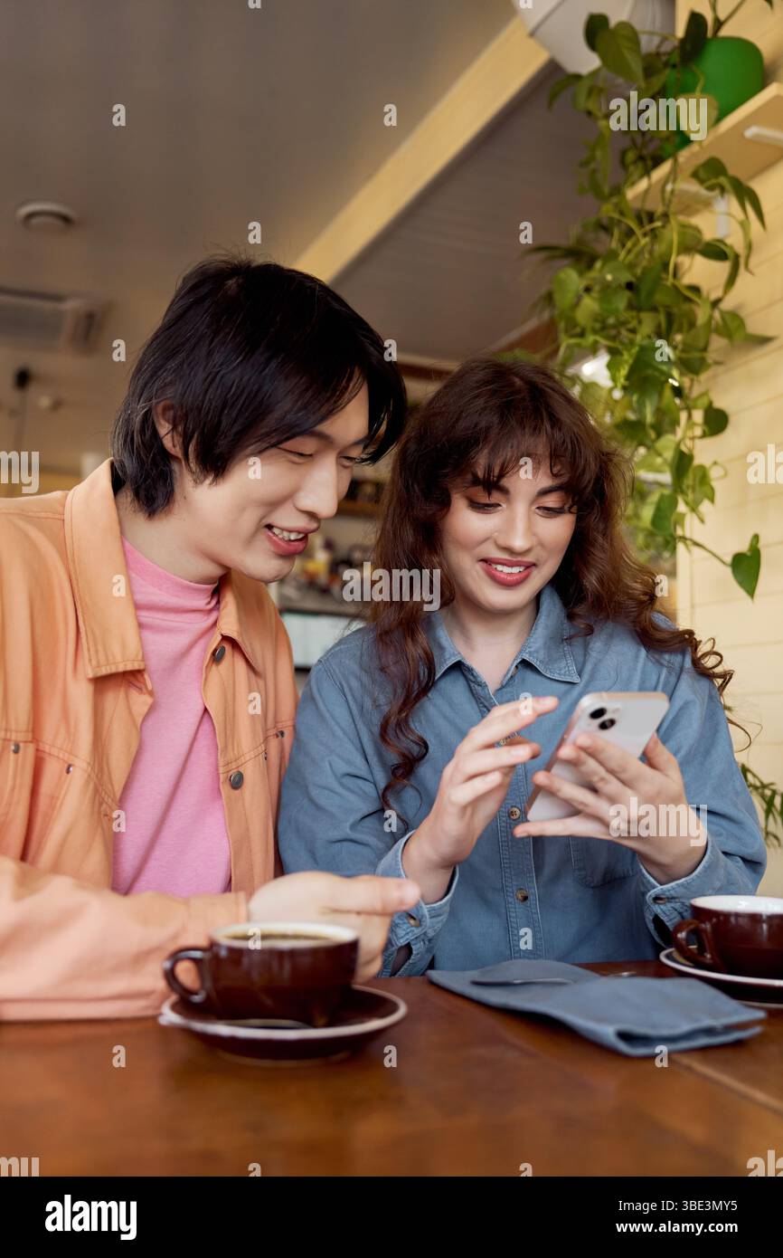 Two friends exploring cozy hi-res stock photography and images - Alamy