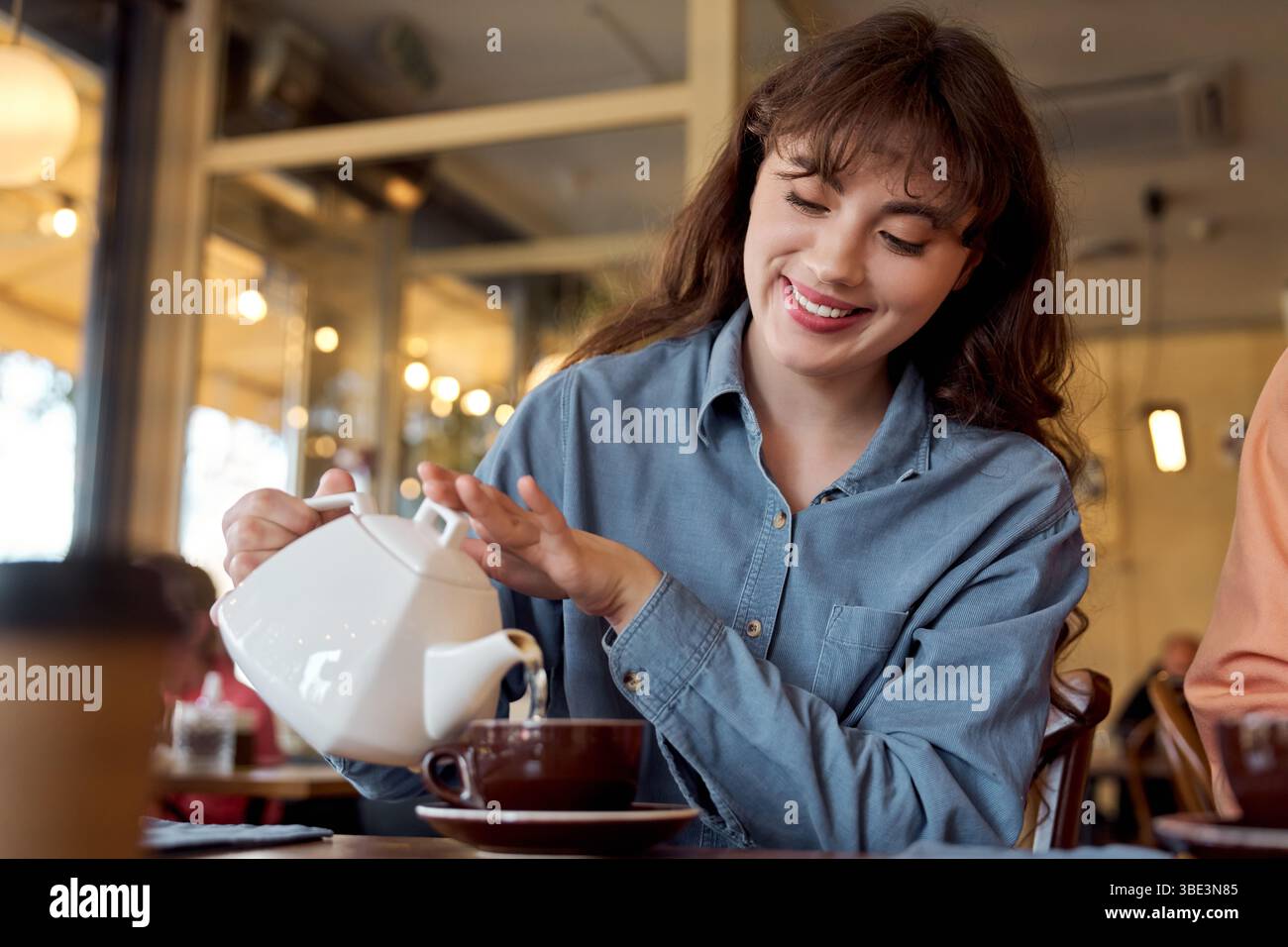 Pouring laughter hi-res stock photography and images - Alamy