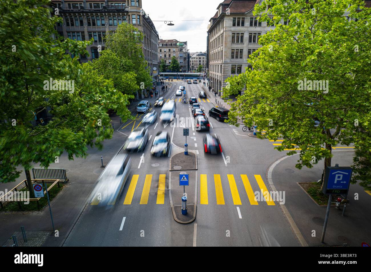 Blurred car traffic above point of view. Daytime long exposure of heavy ...