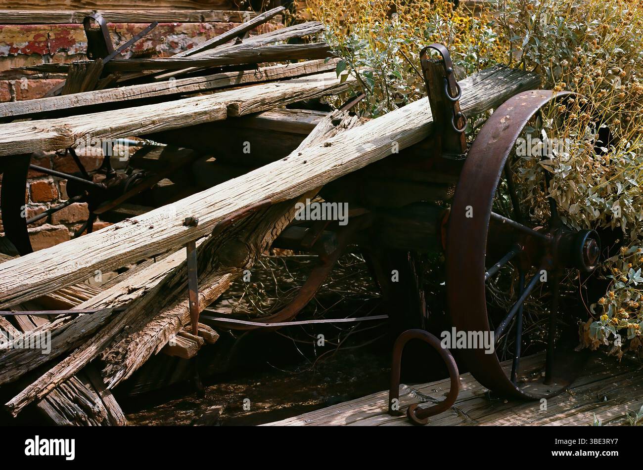 Film image Old Derelict Wooden Wagon beside an old brick wall Stock ...