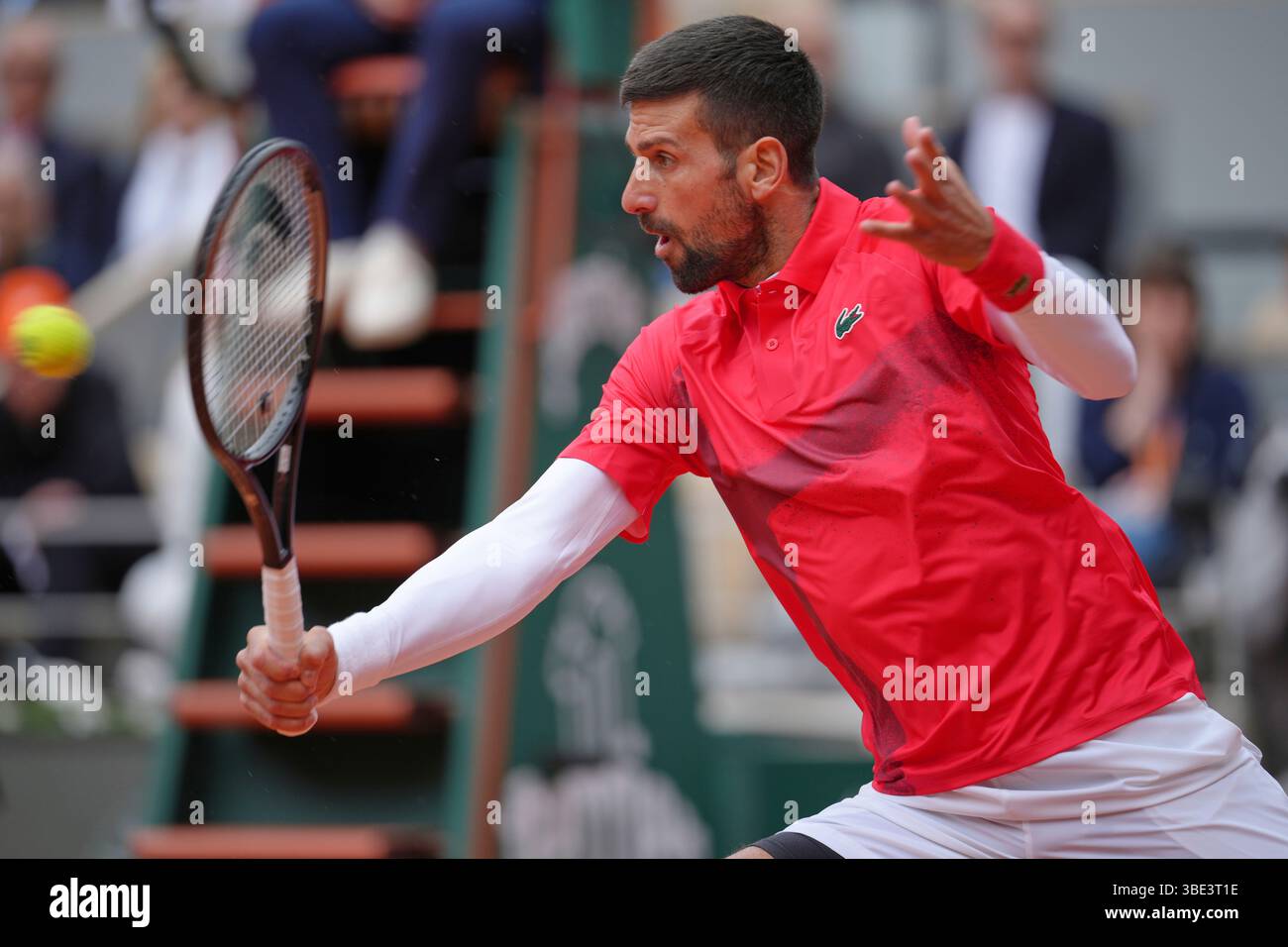 Serbia's Novak Djokovic returns the ball to Mackenzie McDonald of the U ...