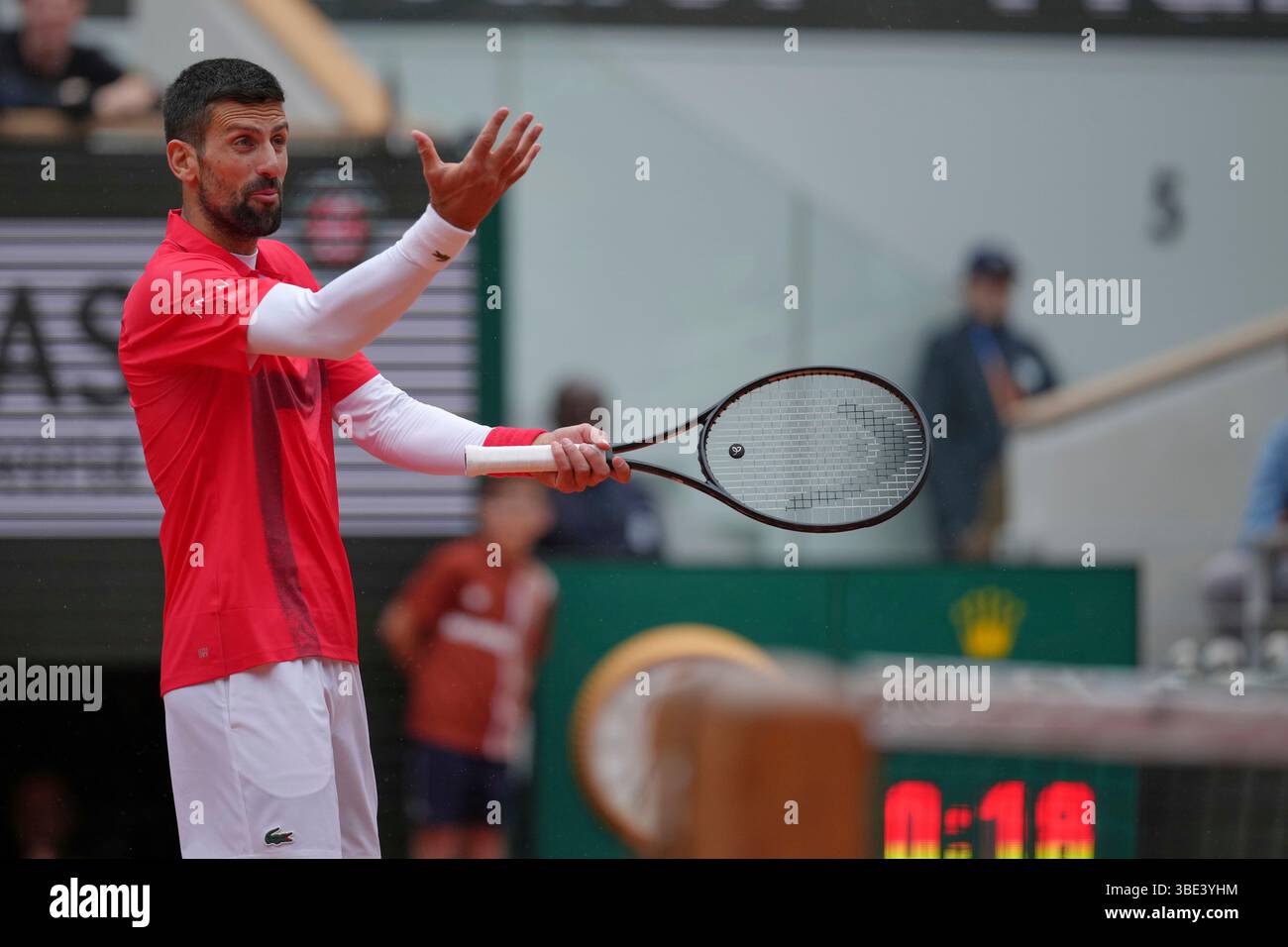 Serbia's Novak Djokovic reacts as he plays Mackenzie McDonald of the U ...