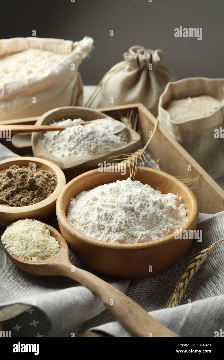Different types of flour on table, closeup Stock Photo - Alamy