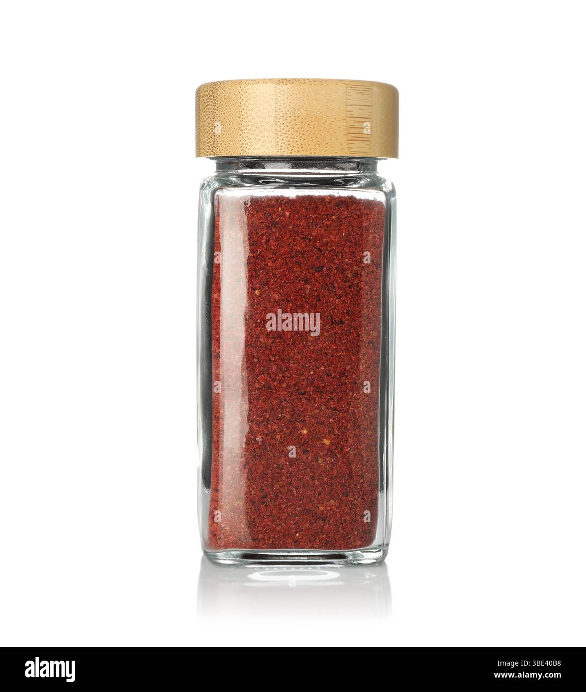 Ground red pepper in spice jar isolated on white Stock Photo - Alamy