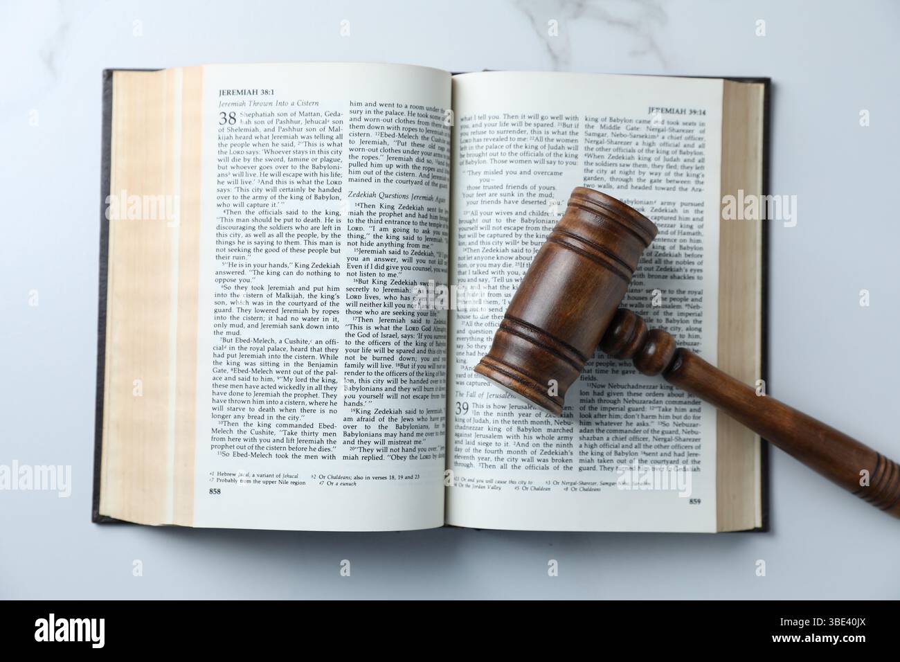 Judge's gavel and Bible on white marble table, top view Stock Photo - Alamy