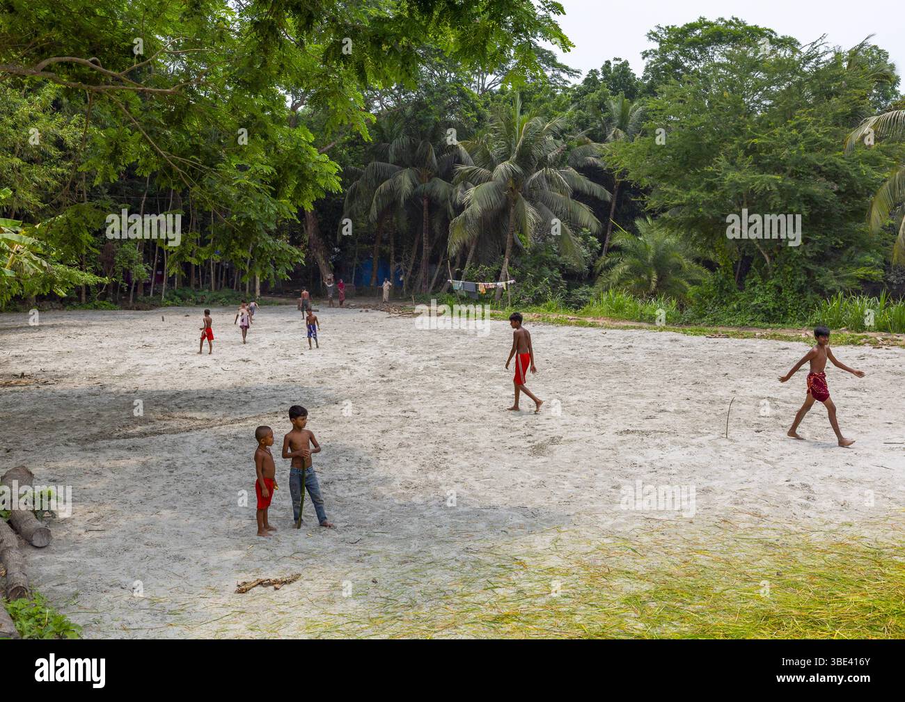 Bangladeshi boys playing football in the countryside, Dhaka Division ...