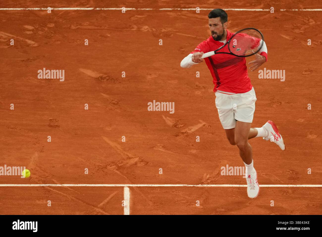 Serbia's Novak Djokovic returns the ball to Mackenzie McDonald of the U ...