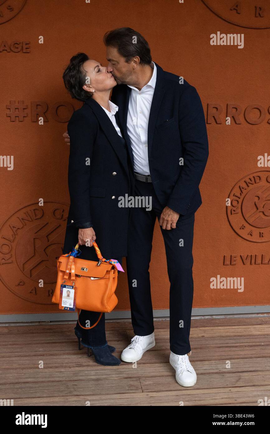 Paris, France. 27th May, 2025. Henri Leconte and Maria Dowlatshahi take ...