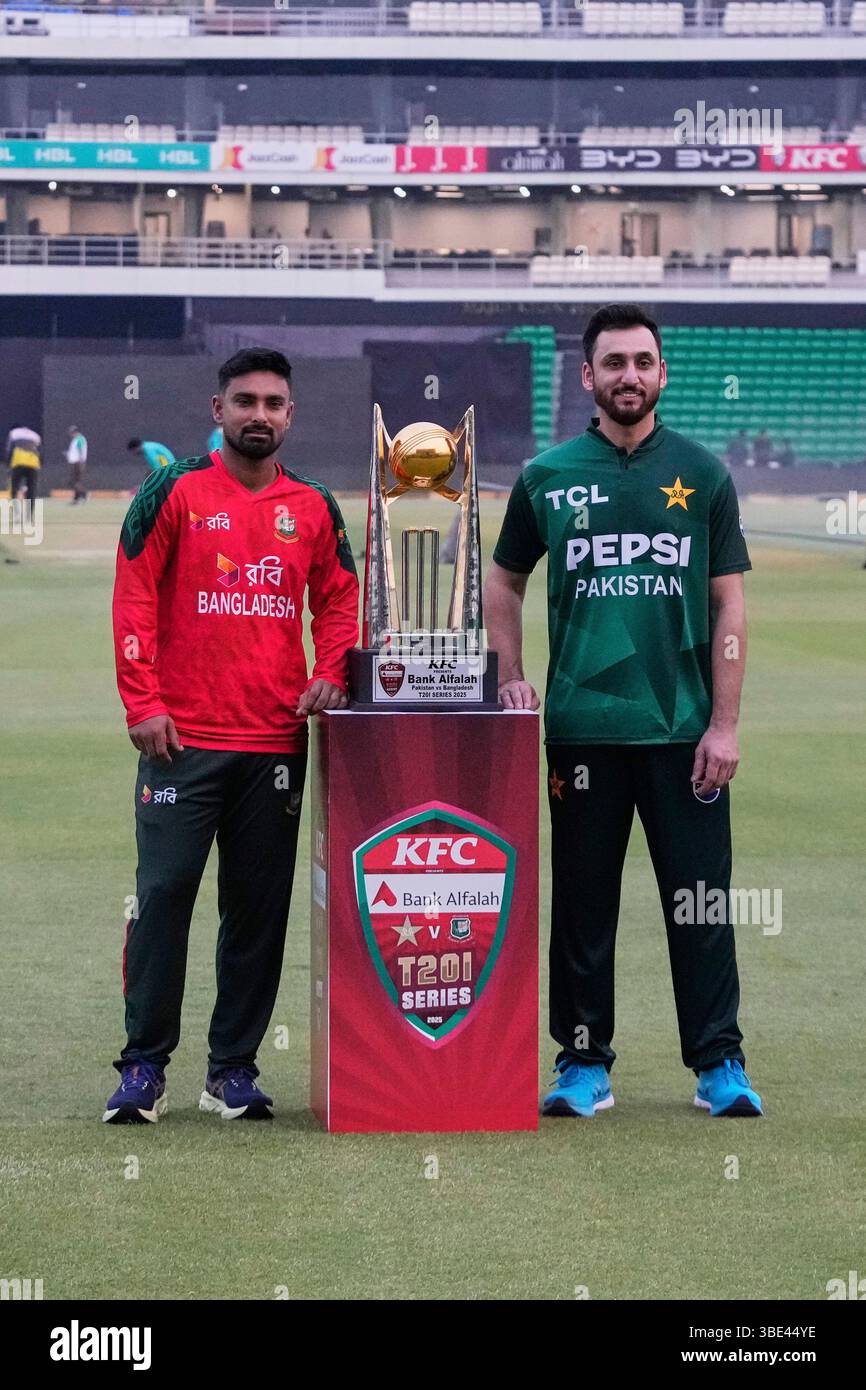 Bangladesh T20 team's skipper Litton Das, left, and his Pakistani counterpart Salman Ali Agha ...