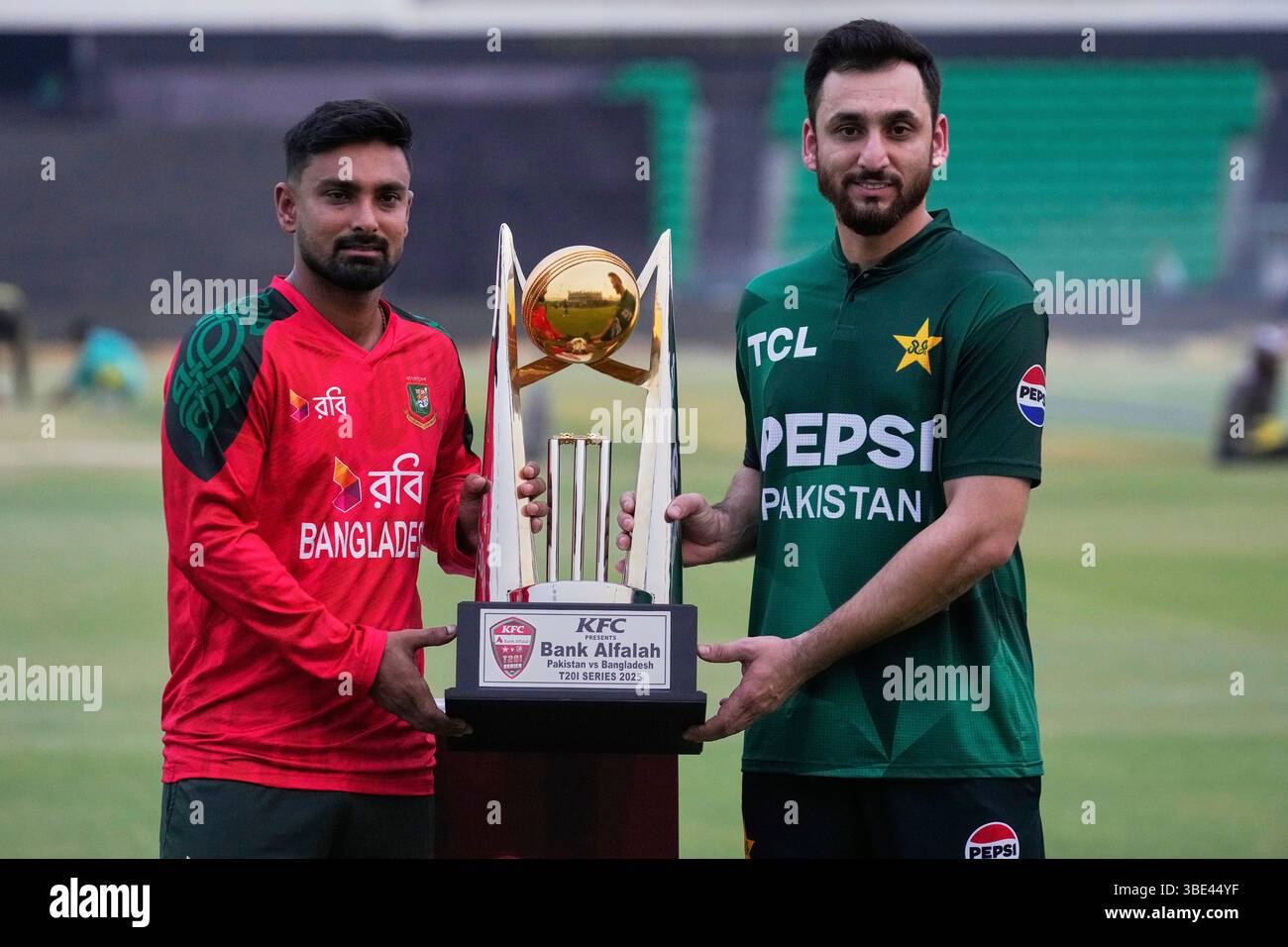 Bangladesh T20 team's skipper Litton Das, left, and his Pakistani counterpart Salman Ali Agha ...