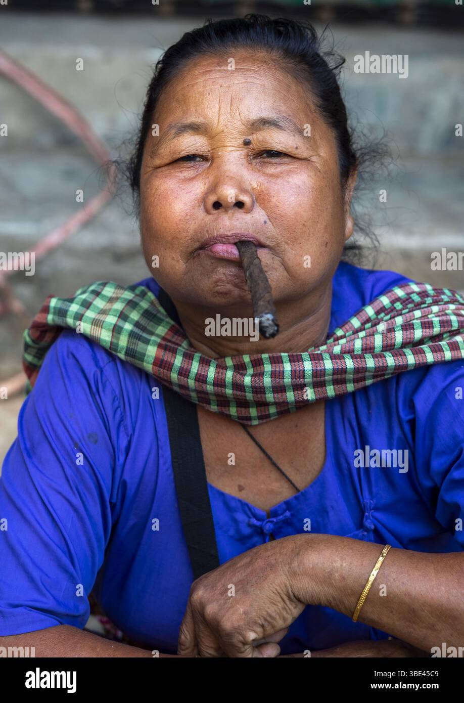 Woman smoking a cigar, Chittagong Division, Bandarban, Bangladesh Stock ...