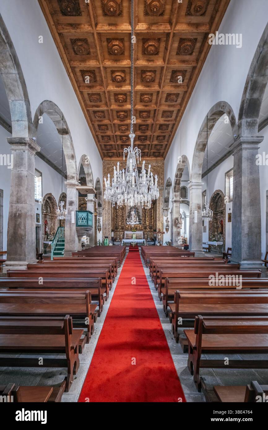 Historic Church Interior With Ornate Coffered Ceiling And Red Carpet ...