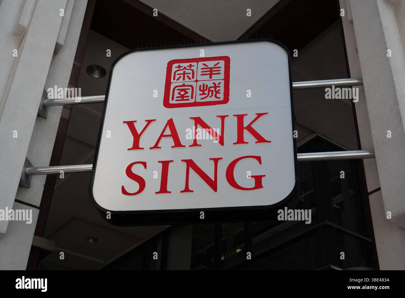 Hanging sign with red lettering and Chinese characters for Yank Sing ...