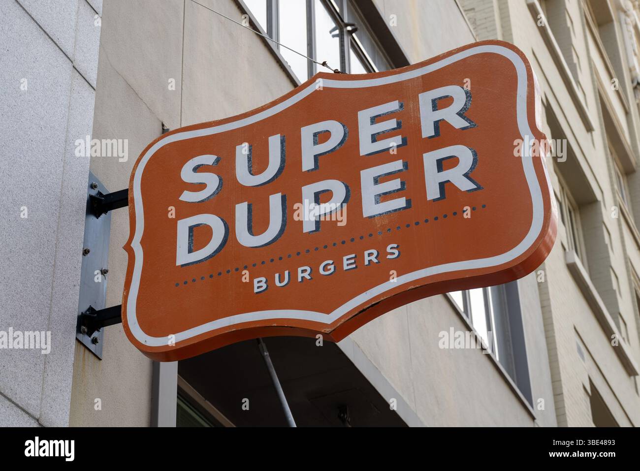 Hanging Super Duper Burgers sign on building facade, San Francisco ...