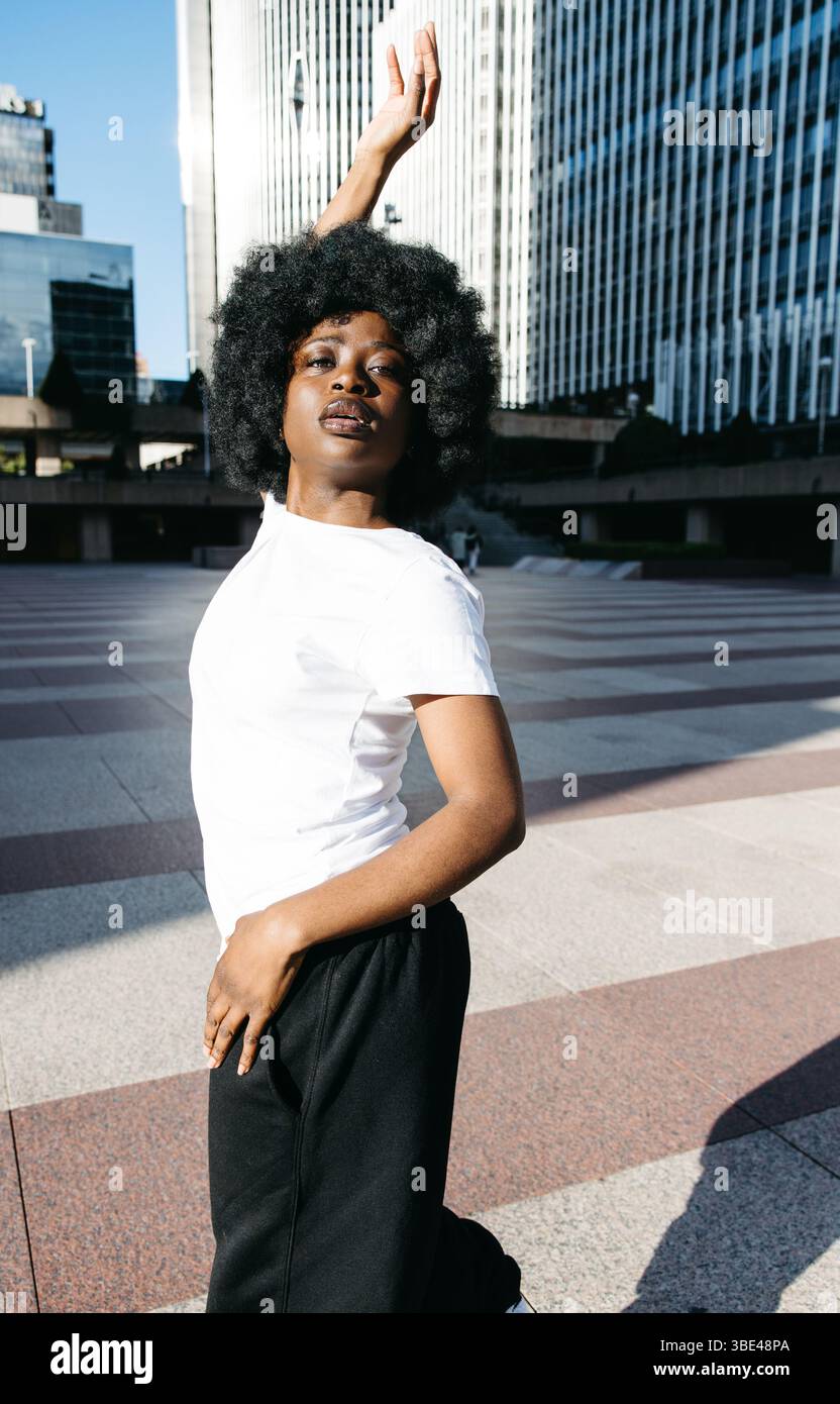 Model striking pose afro hi-res stock photography and images - Alamy