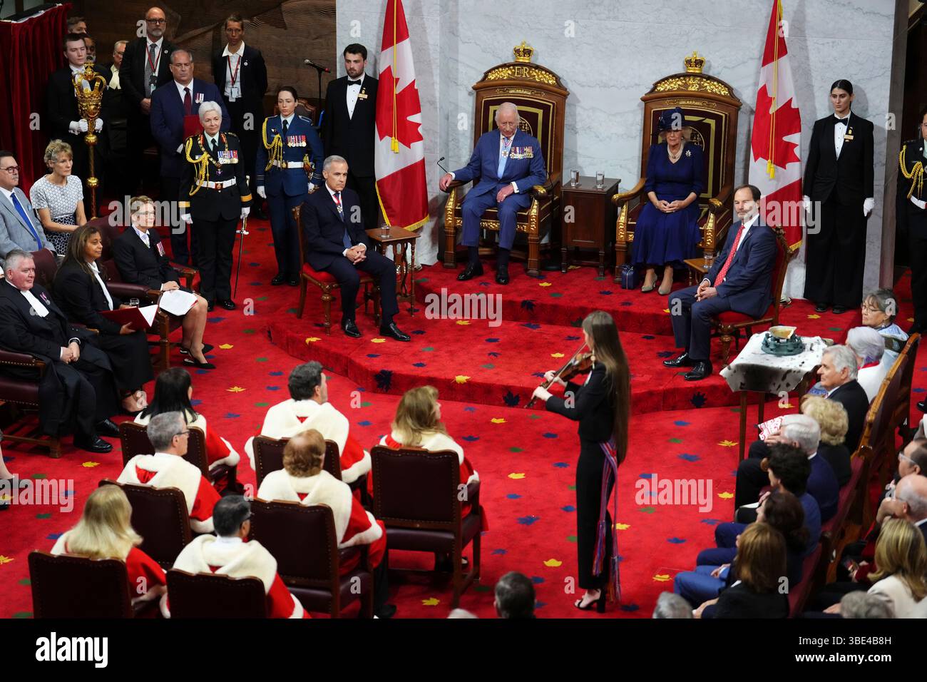 King Charles and Queen Camilla look on during a performance ahead of the King delivering the ...