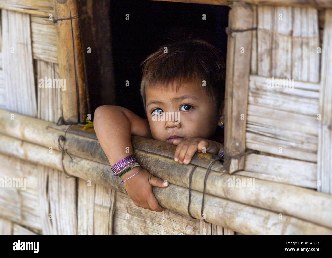 Murong ethnic group girl in the window of a bamboo house, Chittagong ...
