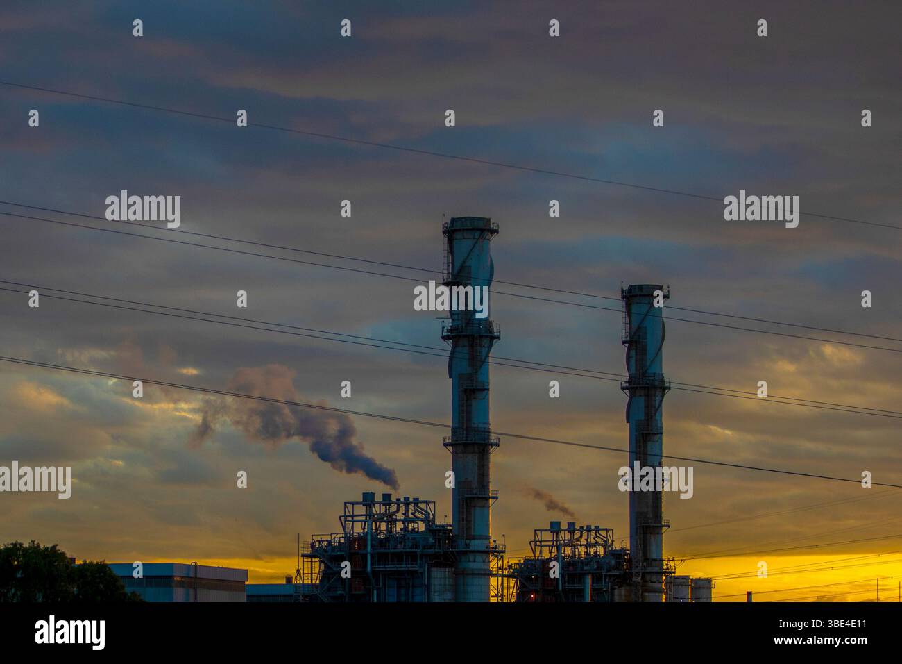 Nesher Israeli Cement factory at sunset Stock Photo - Alamy
